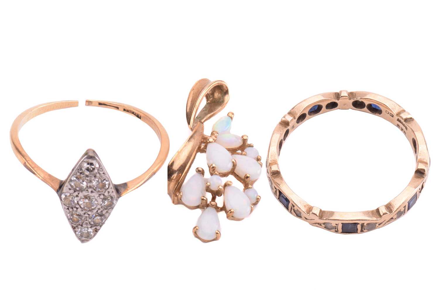 Lot 309 - A diamond lozenge shape cluster ring, set