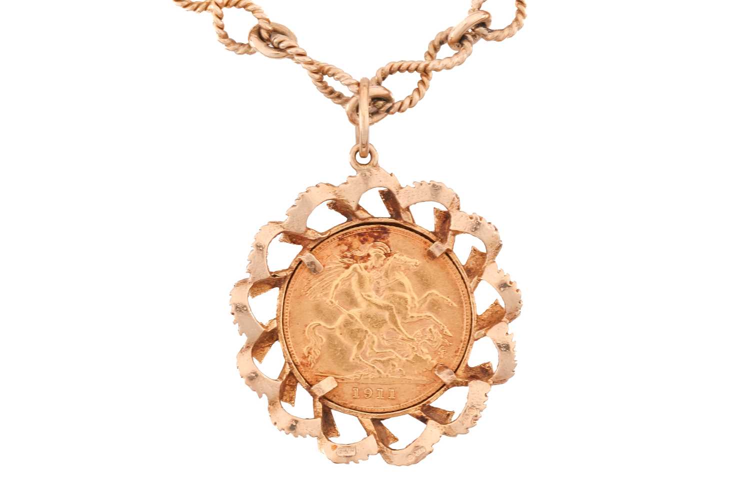 Lot 157 - A George V half sovereign pendant on chain,