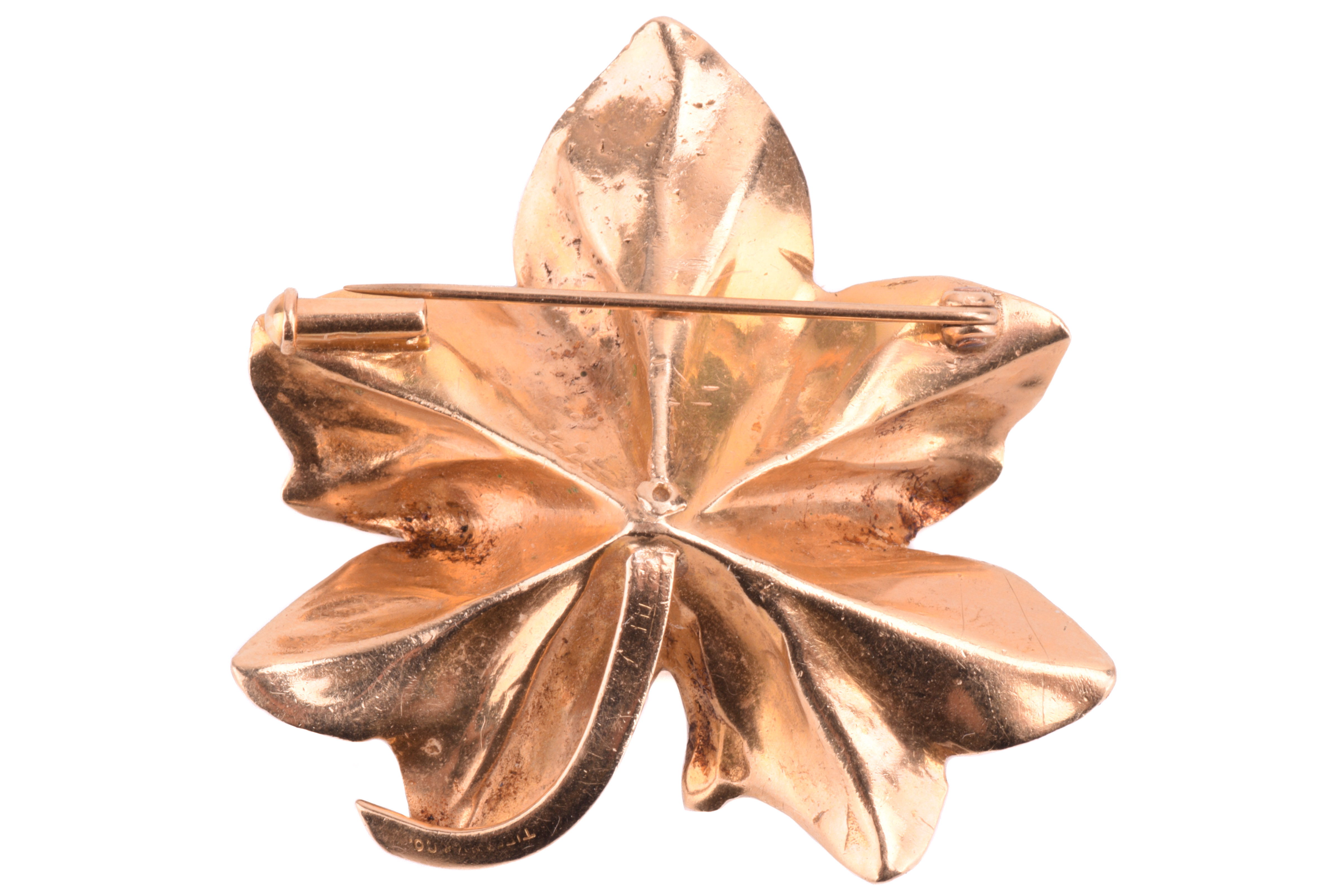 Lot 234 - Tiffany & Co. - A diamond leaf brooch,