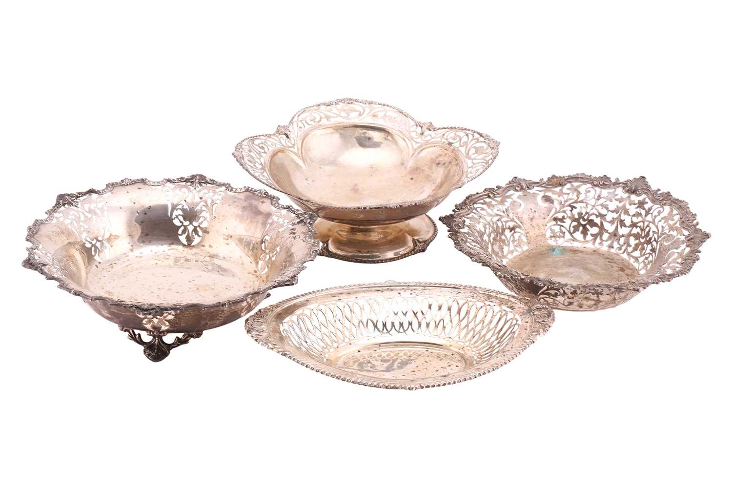 Lot 431 - Four silver pierced bowls, one of round form