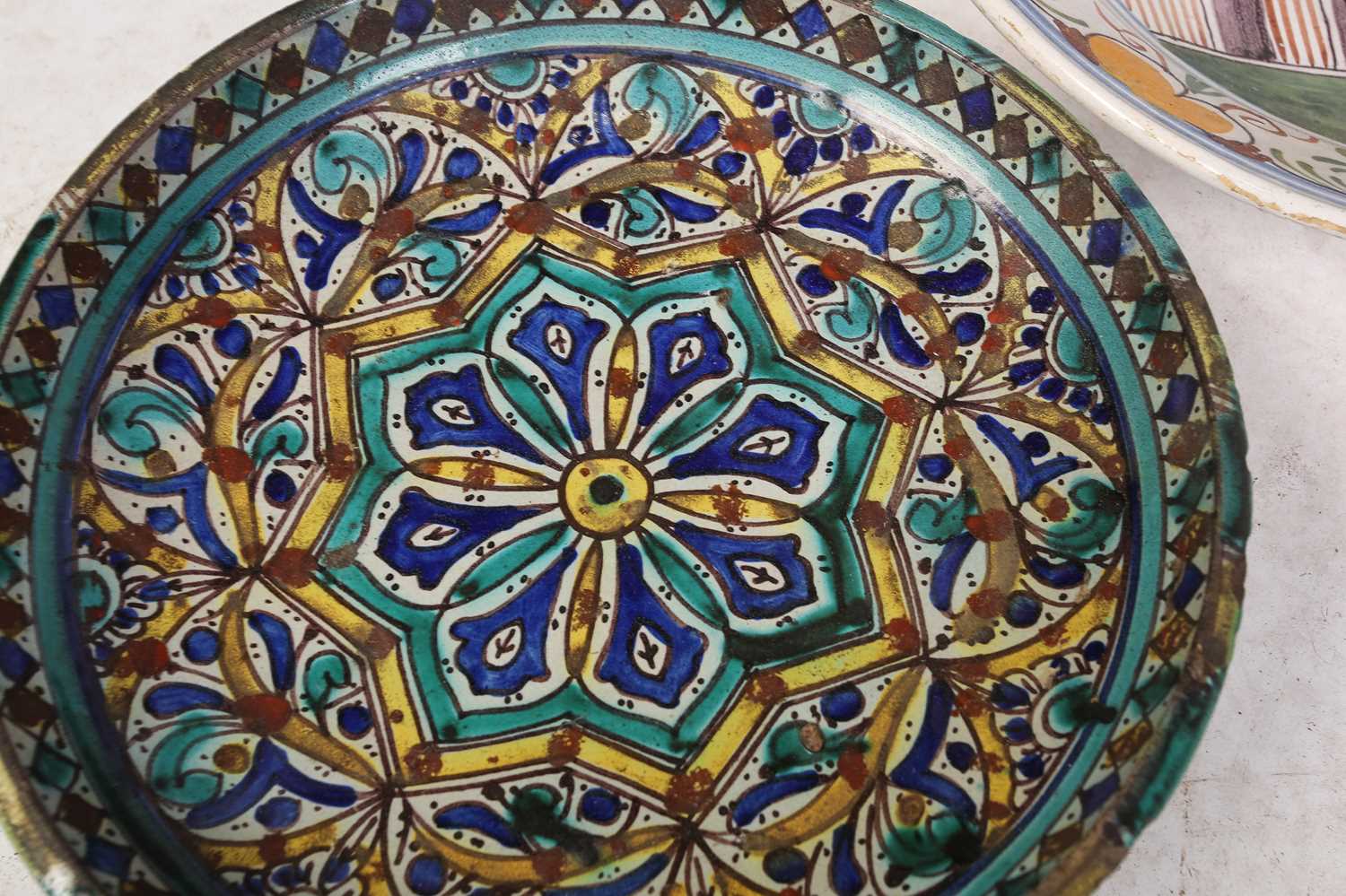 Lot 148 - An Eastern tin-glazed footed circular dish