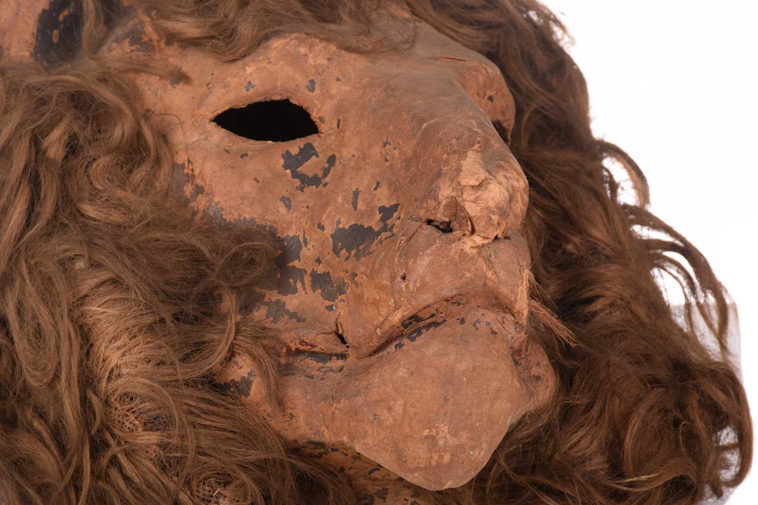 Lot 330 - An original papier mache lion mask, used as