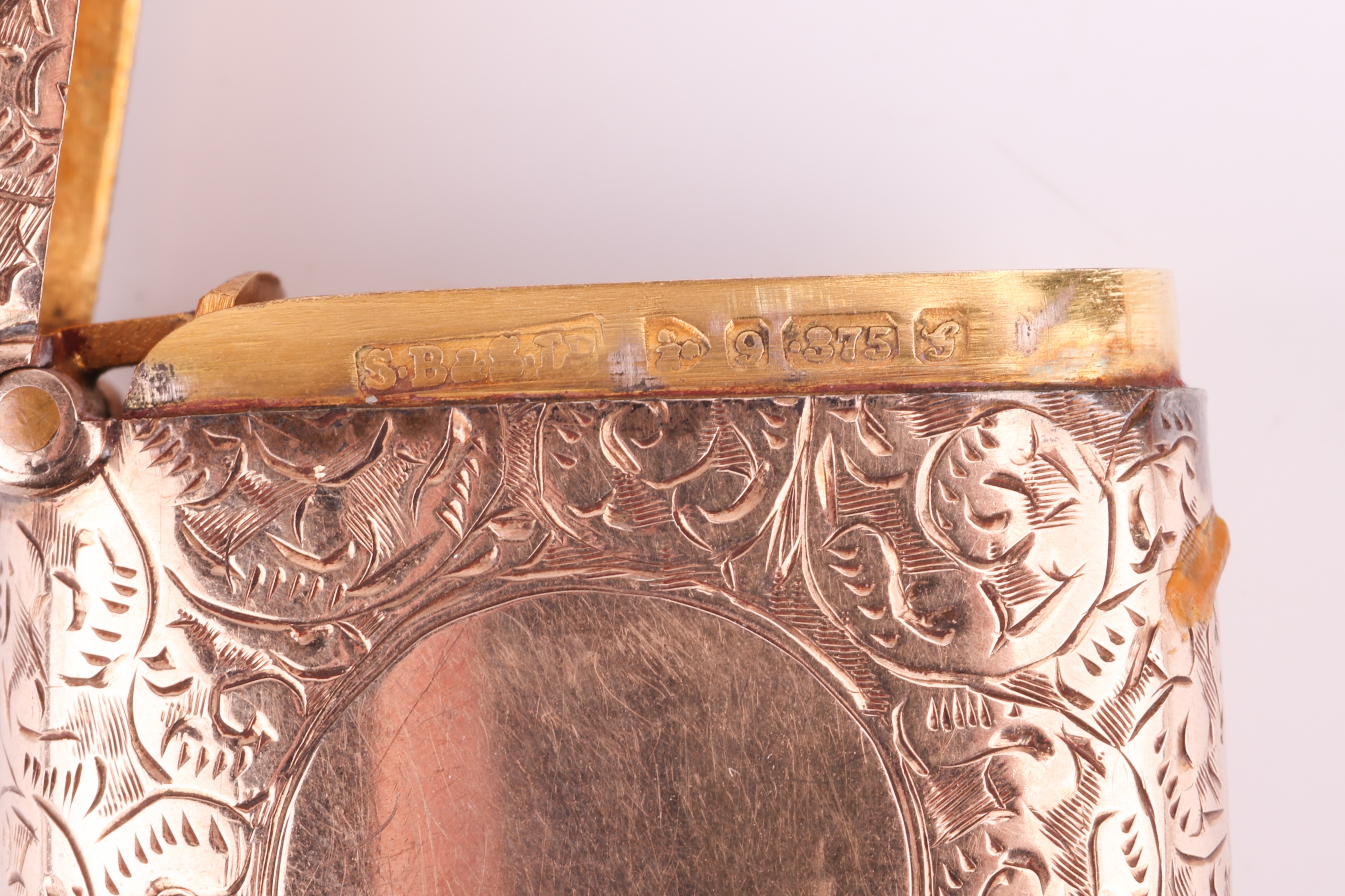 Lot 154 - An Edwardian combined sovereign holder and