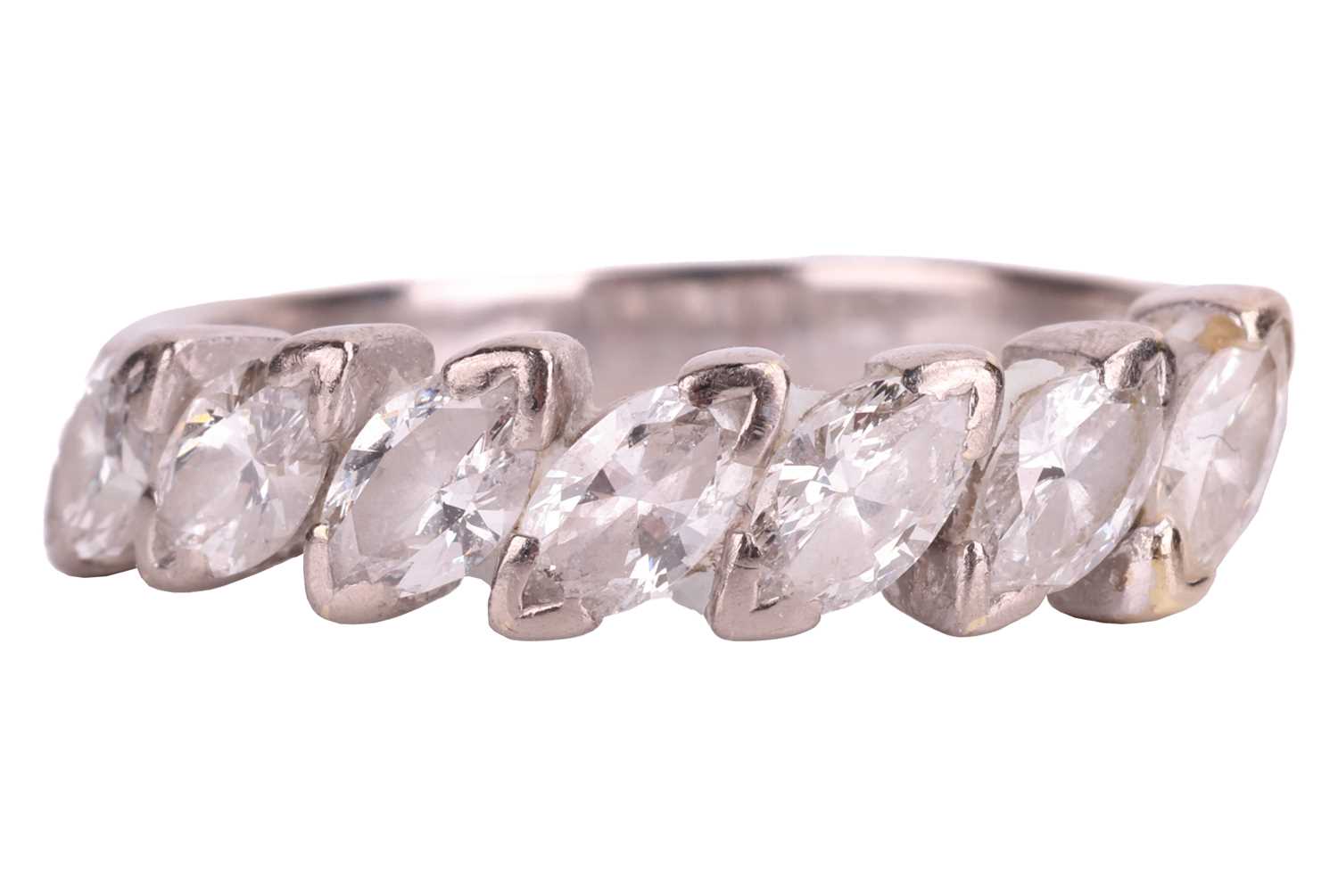 Lot 92 - A diamond set seven-stone ring, featuring