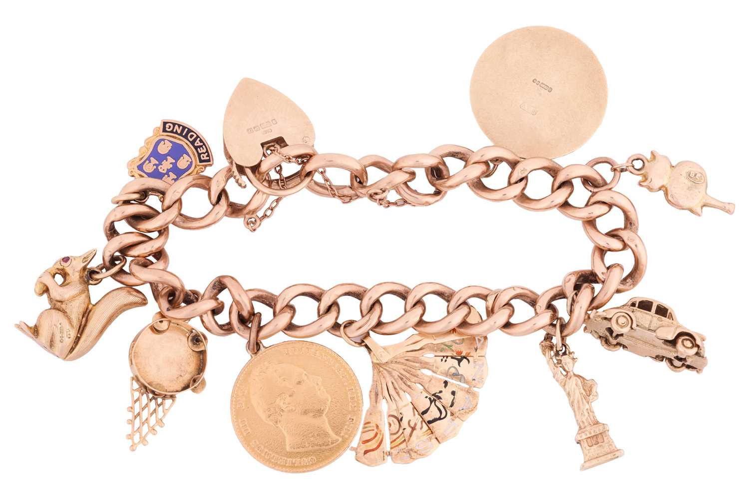 Lot 44 - A 9ct gold charm bracelet featuring nine