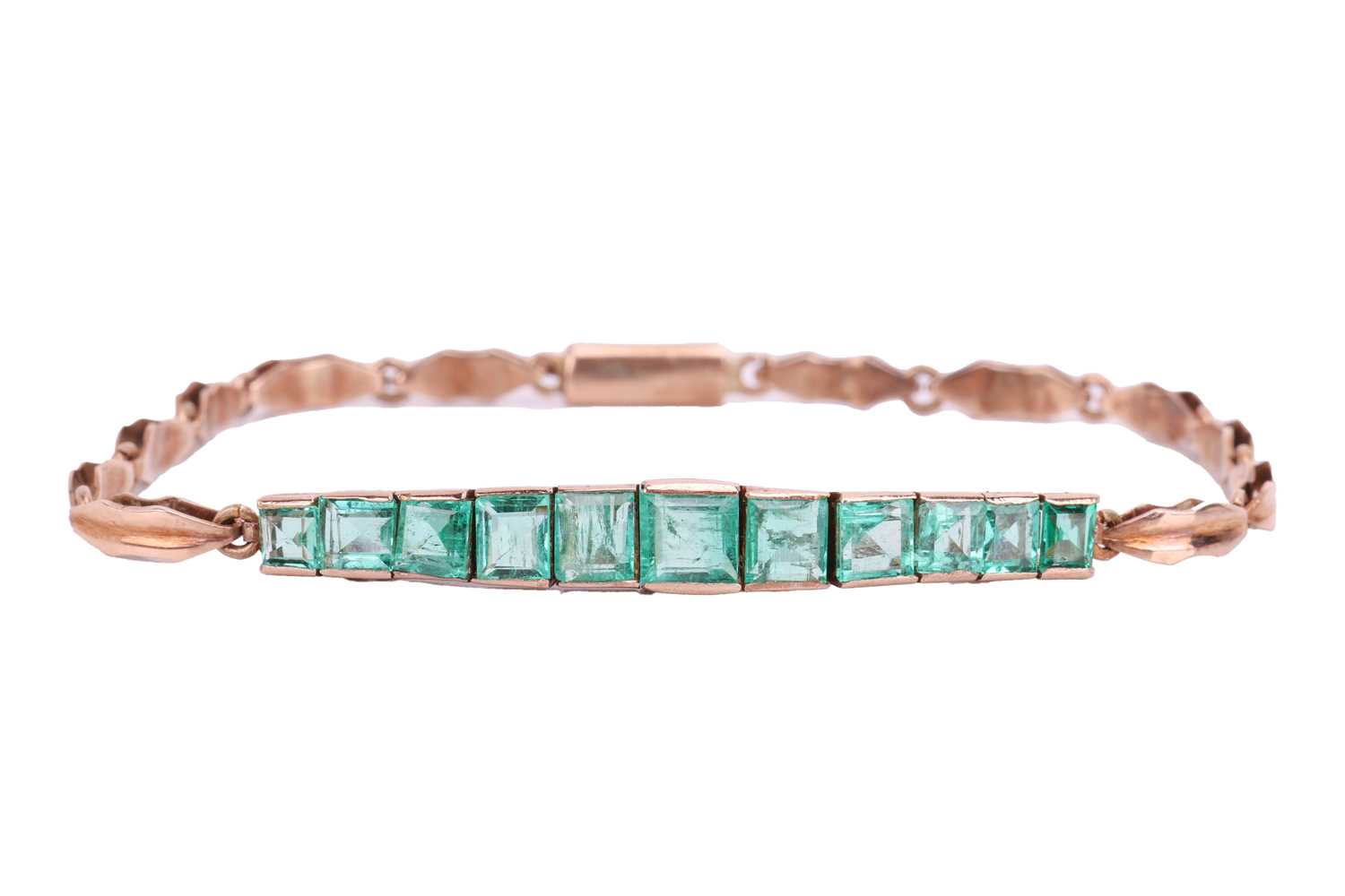 Lot 152 - An Art Deco emerald line bracelet, set with