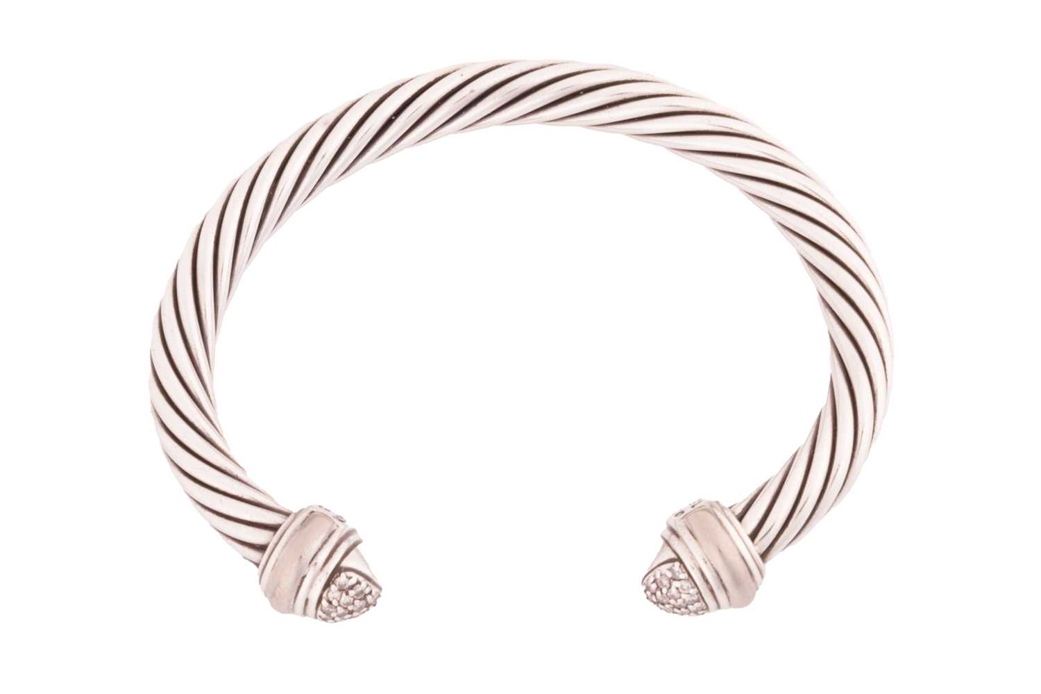 Lot 106 - A diamond-set torque bangle by David Yurman,