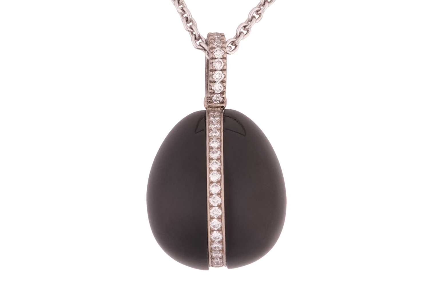 Lot 16 - A Fabergé Whitby jet and diamond egg pendant,