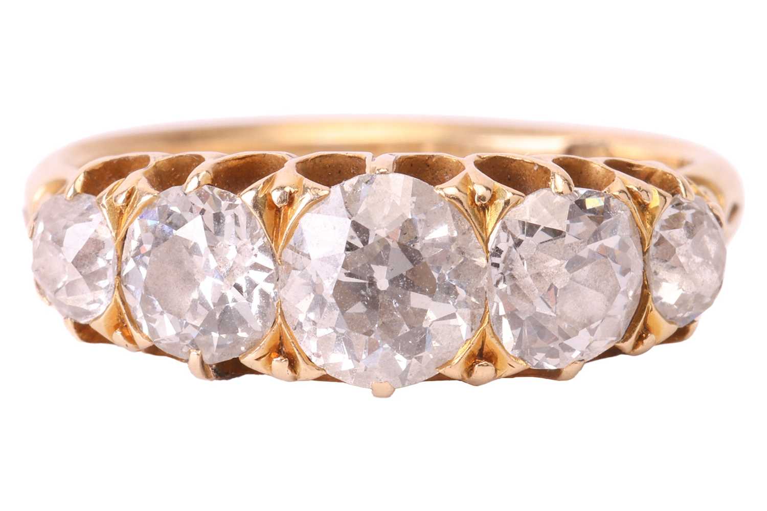 Lot 128 - A diamond five stone half hoop ring, set