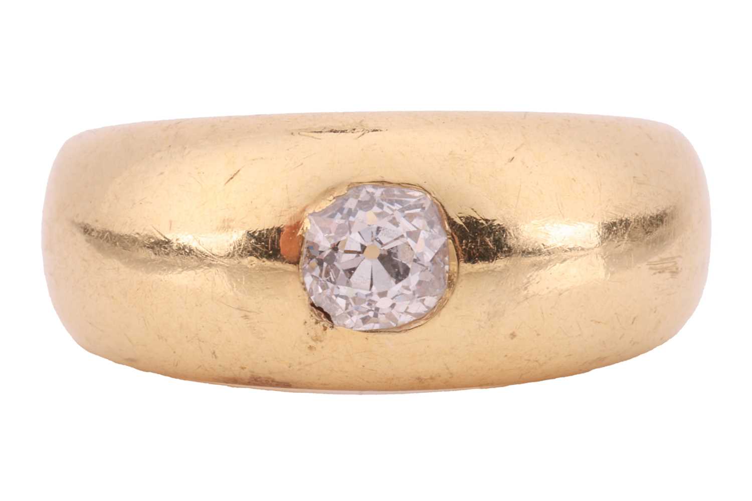 Lot 137 - A diamond-set gypsy ring, flush-set with a