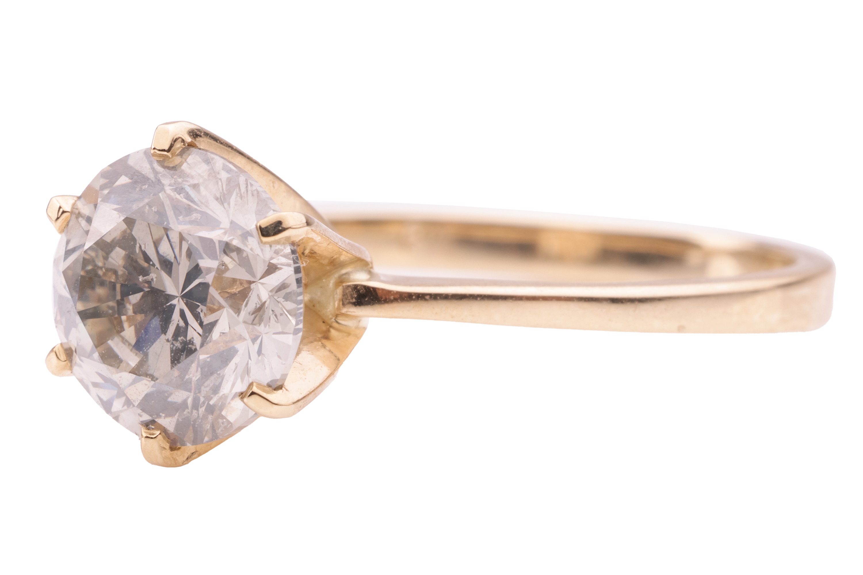 A solitaire diamond ring, claw-set with a