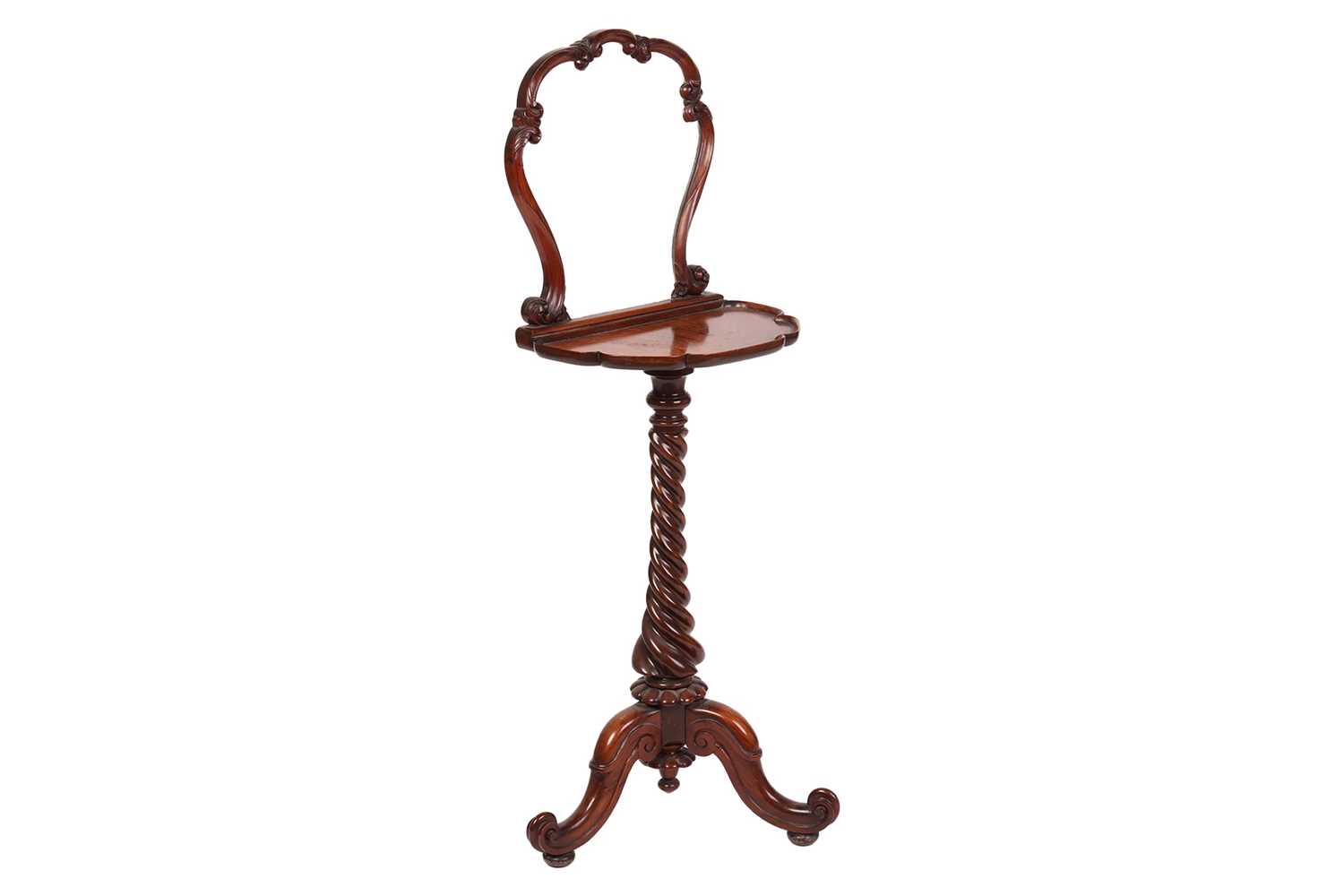 Lot 120 - A Victorian figured walnut sewing table/lamp