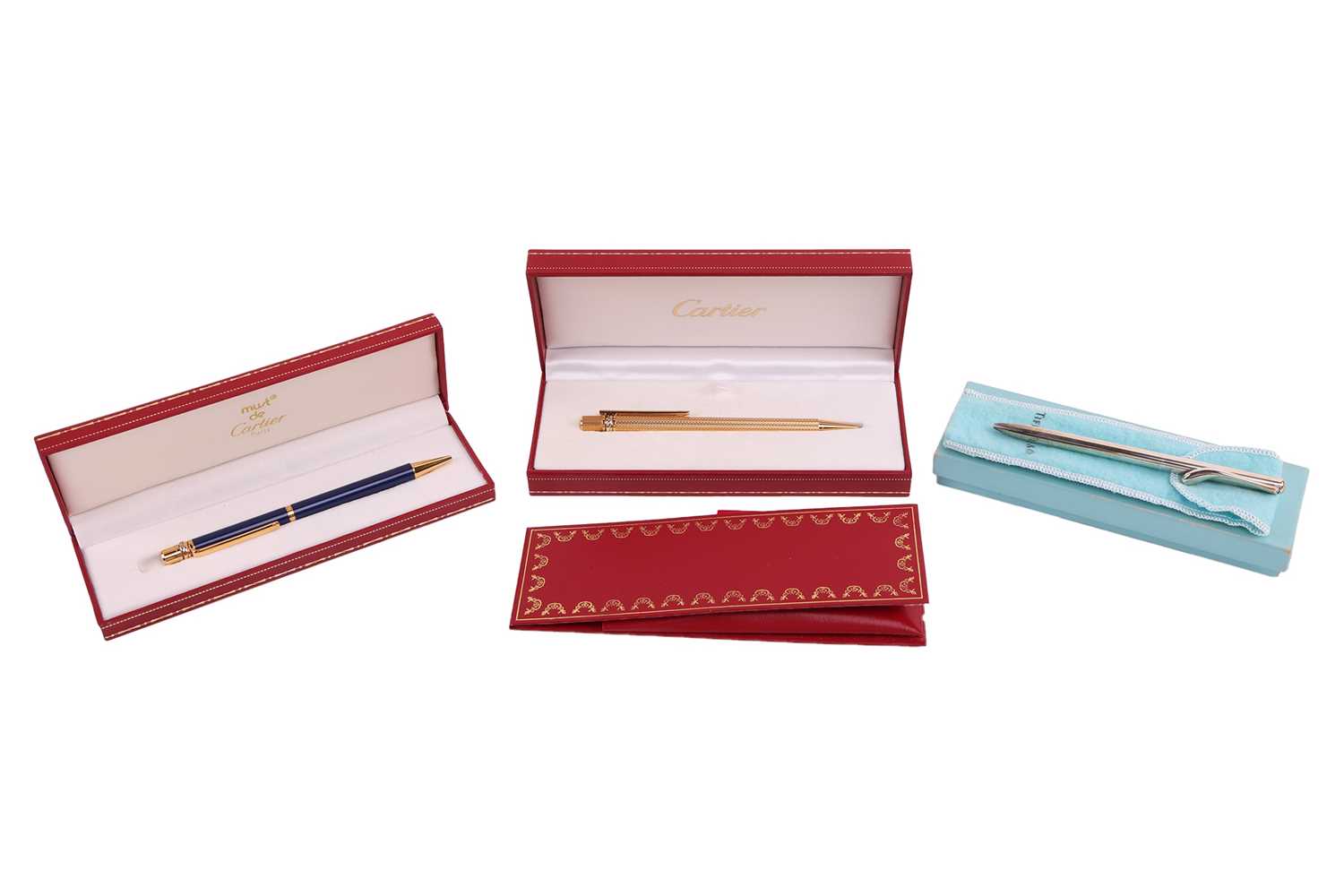Lot 87 - Three pens; comprising a Must de Cartier gilt