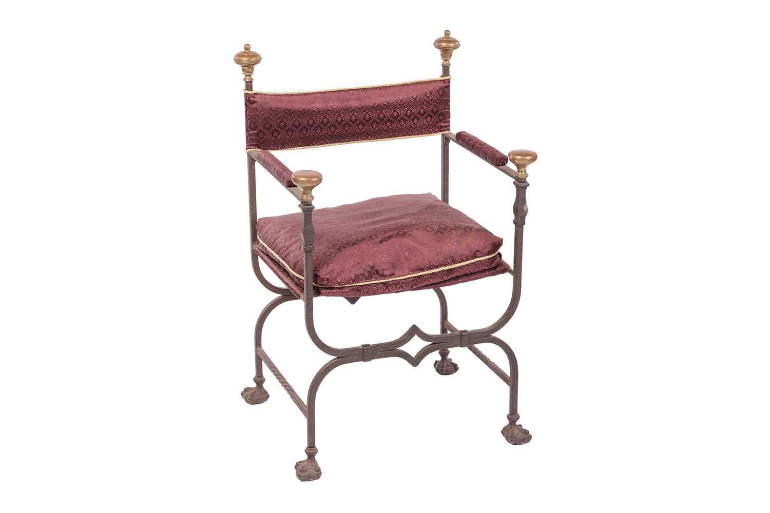 Lot 64 - An Italianate wrought iron "X" frame armchair,