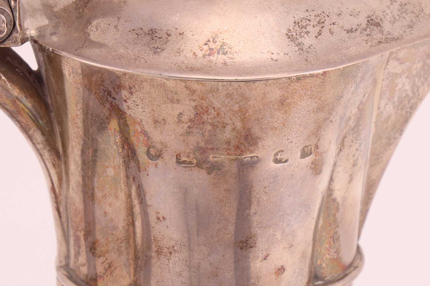 Lot 82 - A Victorian silver communion wine flagon/jug,