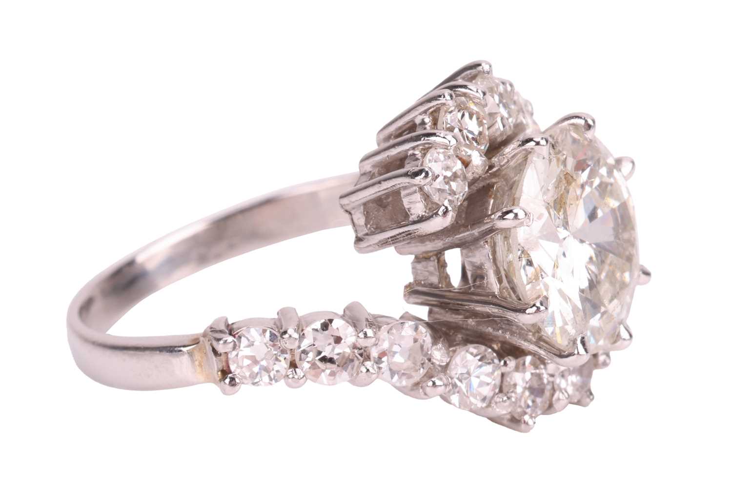Lot 109 - A diamond-set crossover-style ring,
