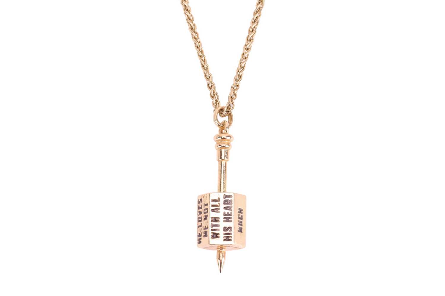 Lot 124 - A spinner pendant on chain, featuring a